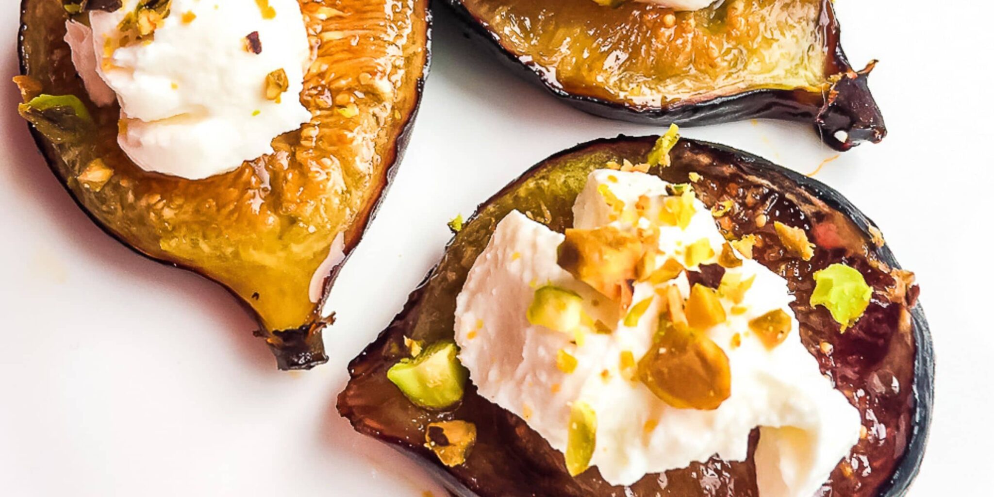 Elegant Honey Roasted Figs Topped With Greek Yogurt And Pistachios ...